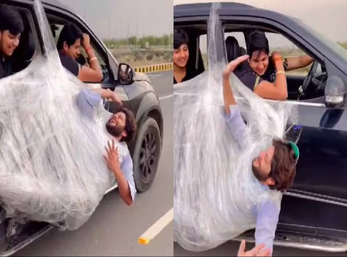 Viral Reel: કારના ગેટ પર ટેપ સાથે યુવકને ચિપકાવ્યો, વાયરલ રીલ પર YouTuberની ધરપકડ | Moneycontrol ...