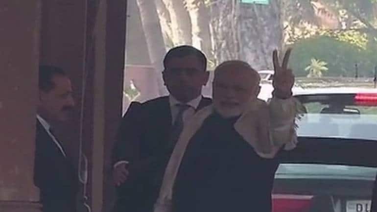PM Narendra Modi flashes victory sign