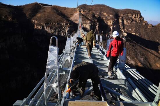 World's tallest and longest glass bridge opens in China - here are some ...