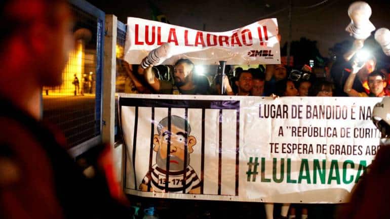 Former President Lula turns himself in to Brazil police, ending standoff