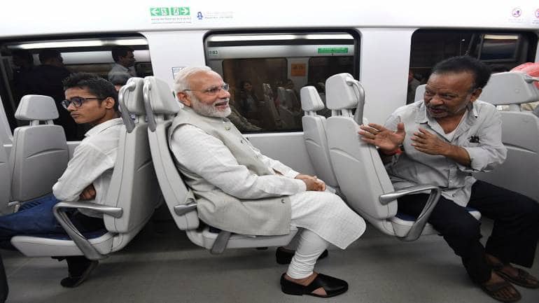 In pics: PM Modi takes metro ride to beat traffic in Delhi