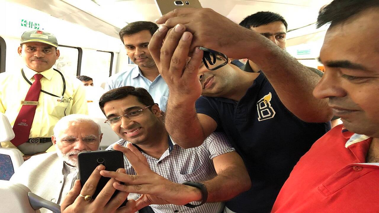 In pics: PM Modi takes metro ride to beat traffic in Delhi ...
