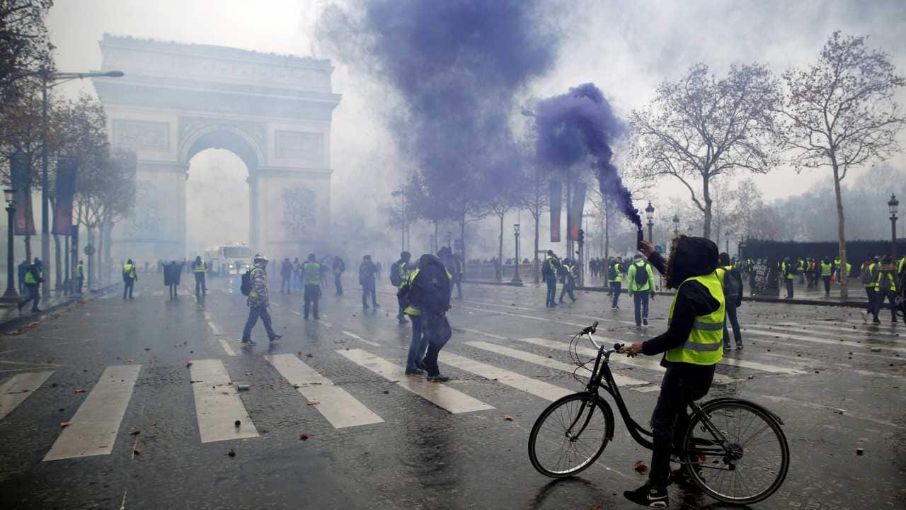Paris riots: A vigilante group, an ultra-liberal president and a ...