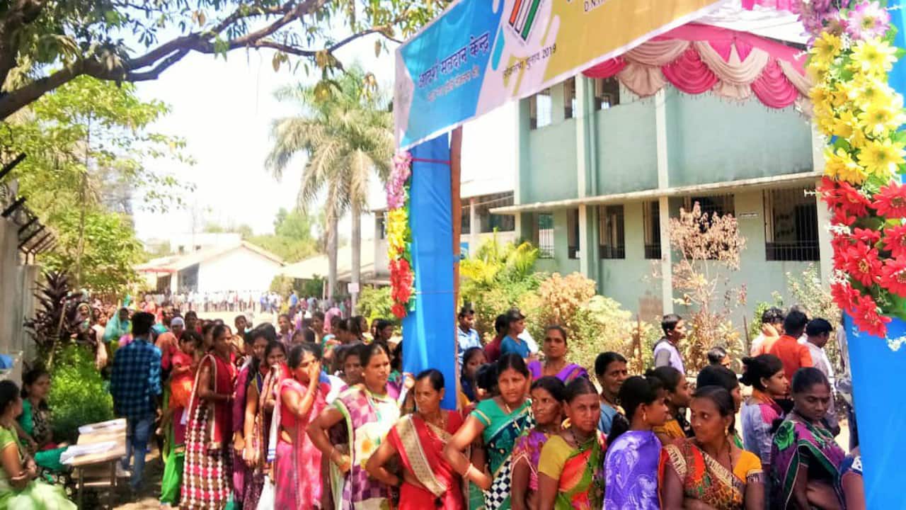 In Pics | Lok Sabha polls Phase 3: Voters brave heat, thunderstorms to ...