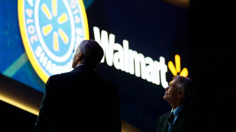 In a first, humans replace robots at Walmart's 4,700 retail outlets