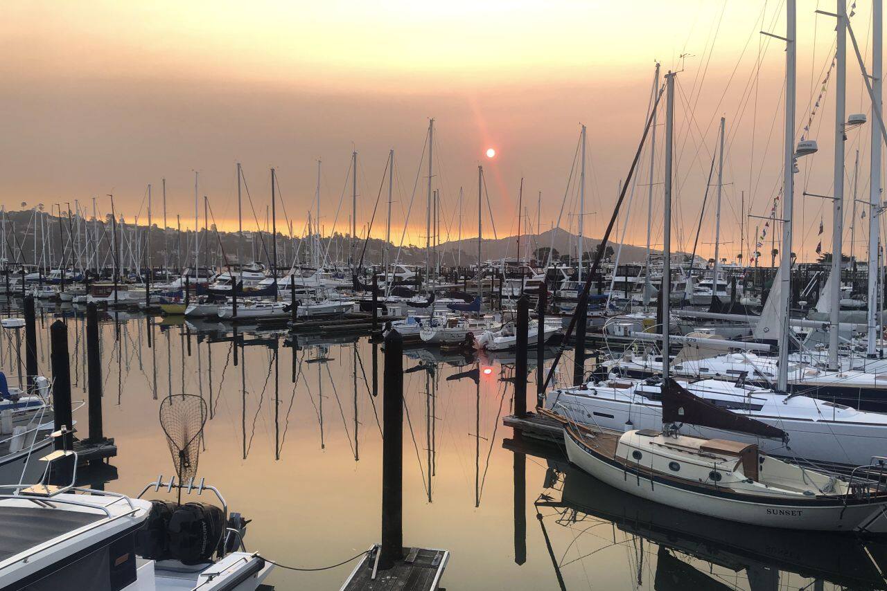 In Pics | California wildfires chase people from homes into smoky air ...