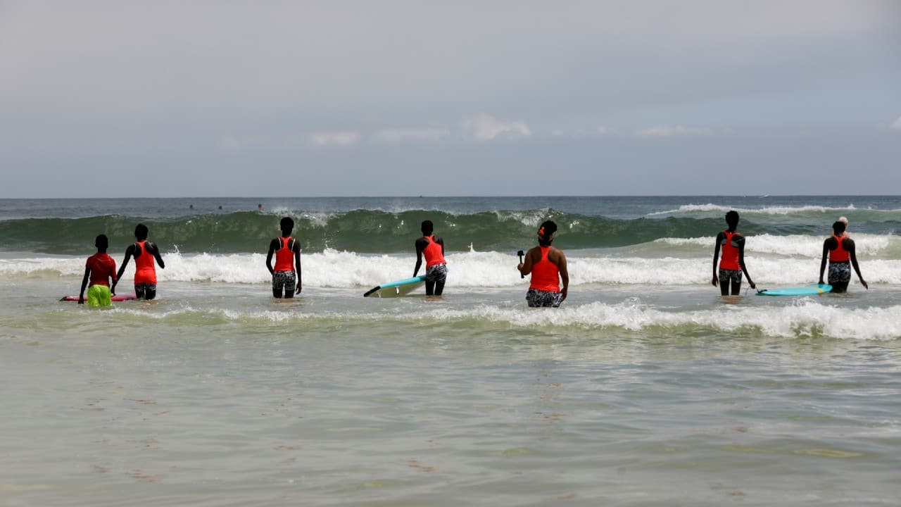 In pics | Senegal’s first female pro surfer takes to the waves to defy ...