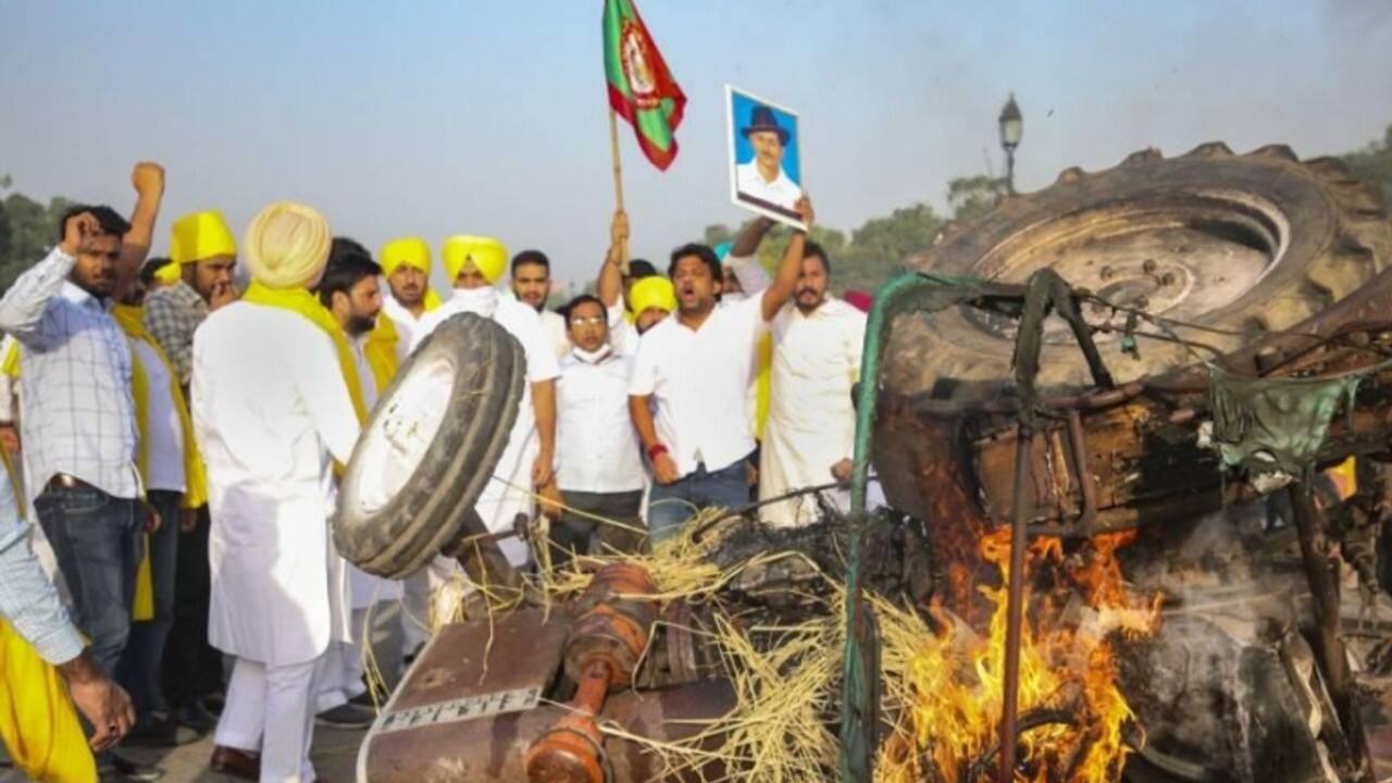 Farmers across India up in arms against farm bills, tractor set afire ...