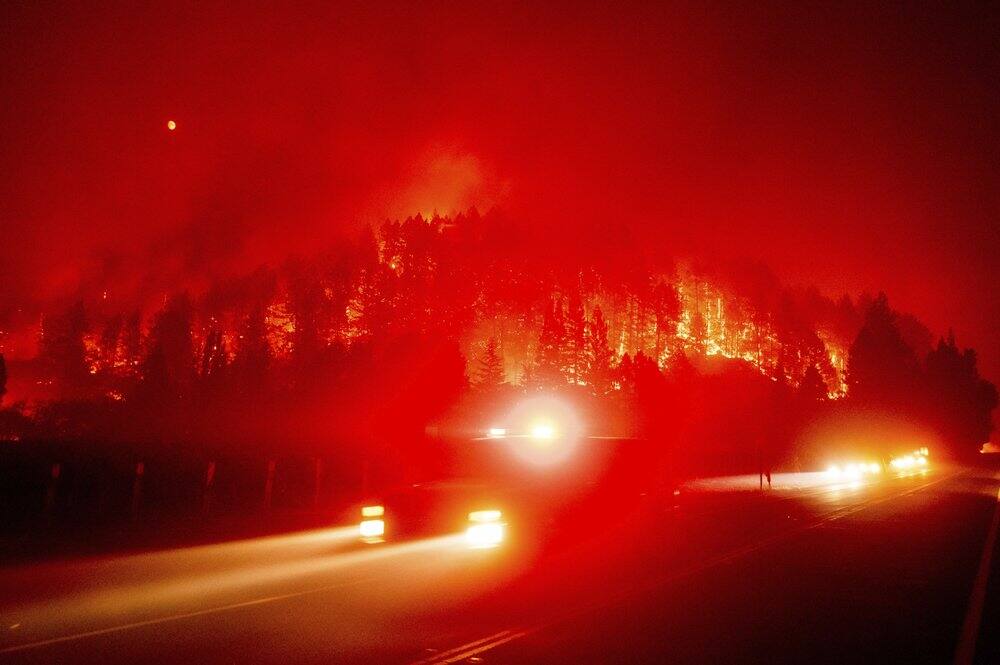 In pics | Fueled by dry winds, fire rages in California wine country ...