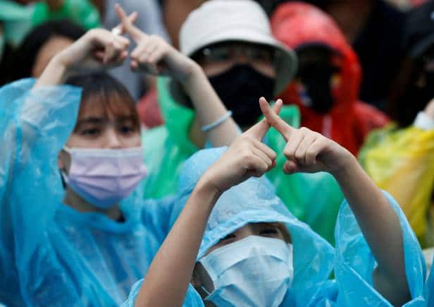 Hand signals only: How thousands of Thais are marshalling orderly protests