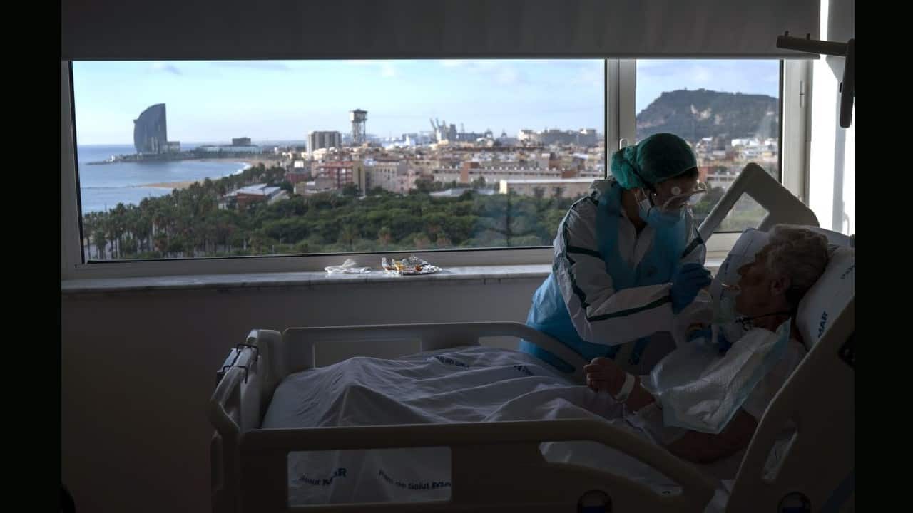 Spanish nurses witness grim solitude of COVID-19