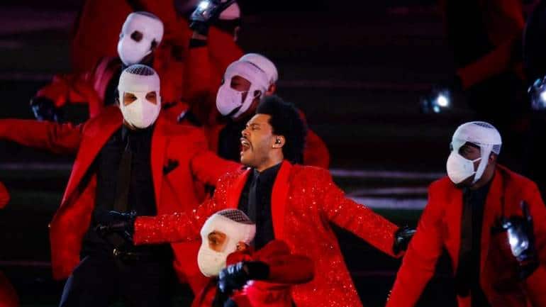 The Weeknd brings bright lights, bandaged dancers to Super Bowl