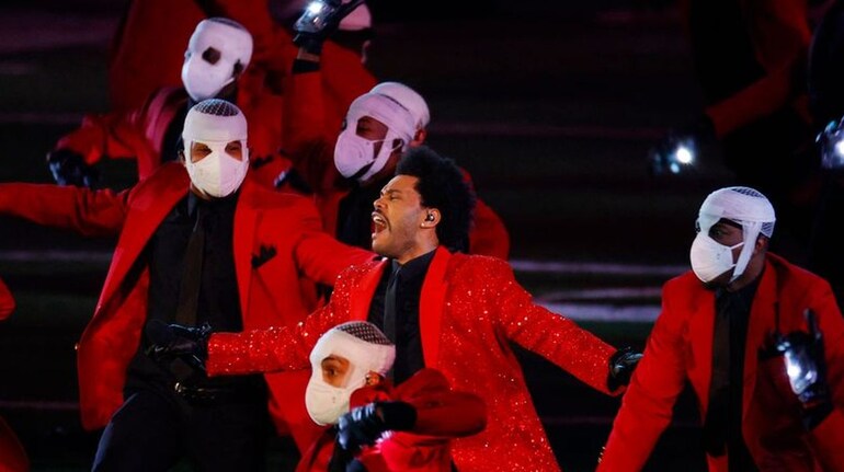 The Weeknd brings bright lights, bandaged dancers to Super Bowl