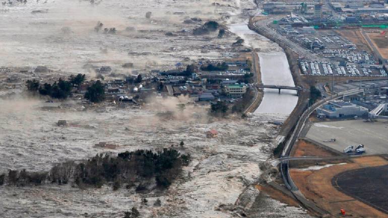 Japan lowers tsunami warning after series of earthquakes but tells ...