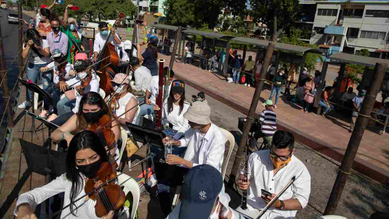'Musical Vaccine': Mobile orchestra tries to bring cheer to Venezuelan ...