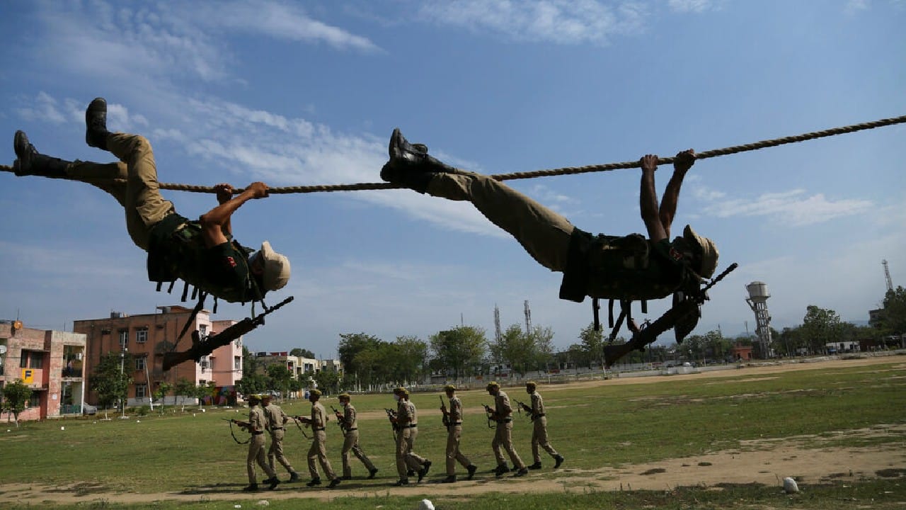 See pictures of police training villagers in Kashmir for border security