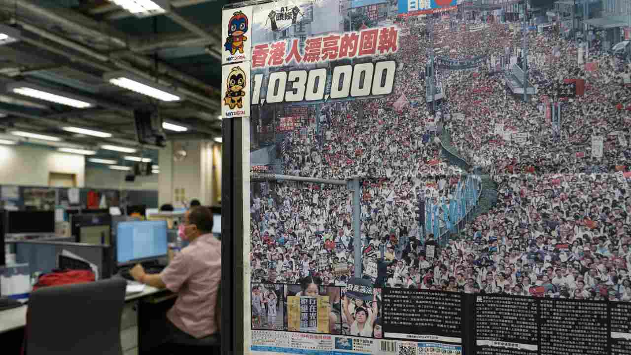 See pictures from China's crackdown on Apple Daily, the Hong Kong pro ...
