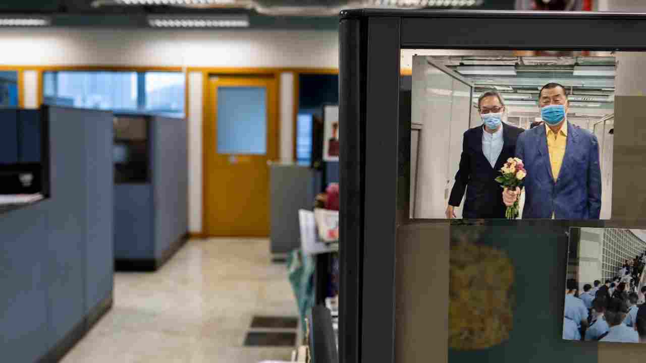 See pictures from China's crackdown on Apple Daily, the Hong Kong pro ...