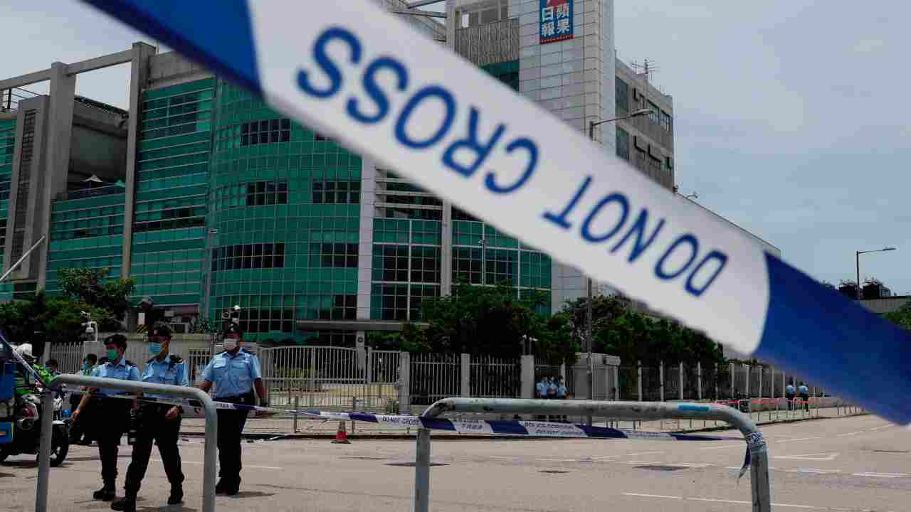 See pictures from China's crackdown on Apple Daily, the Hong Kong pro ...