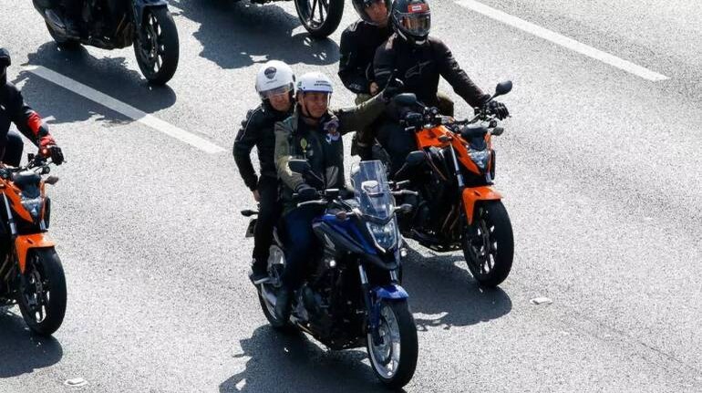 Brazil president Jair Bolsonaro fined for maskless motorcyle rally