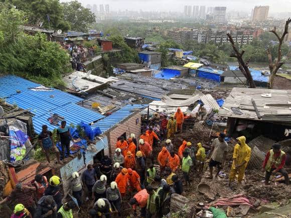 In Pics | Mumbai rain fury claims 33 lives; hits road, rail, air ...