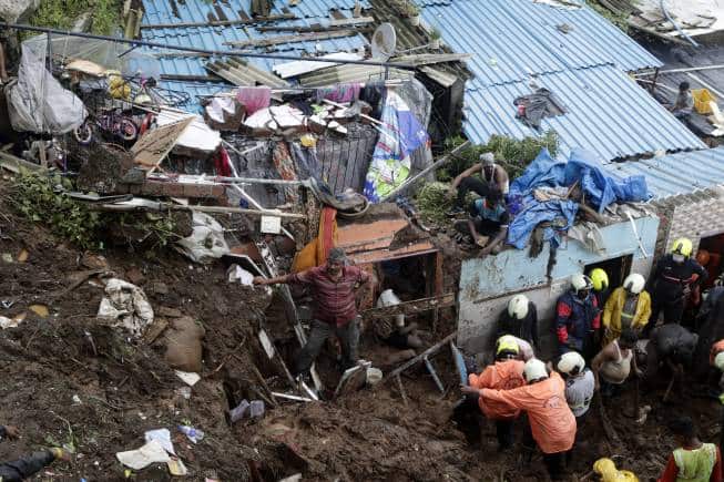 In Pics | Mumbai rain fury claims 33 lives; hits road, rail, air ...