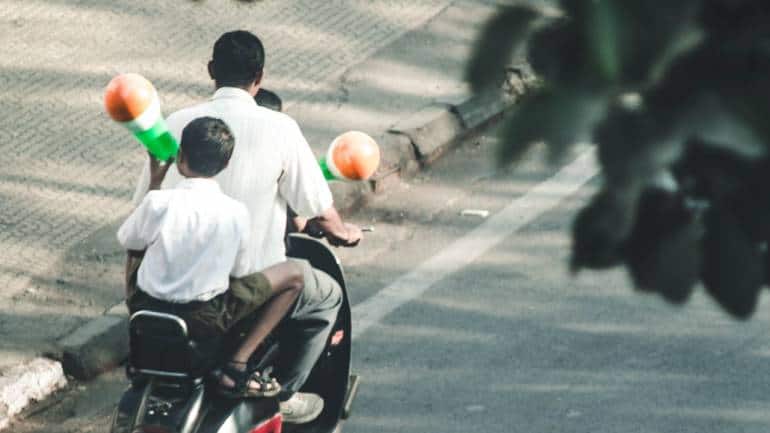 Motorcycling with a child? You must follow these rules now