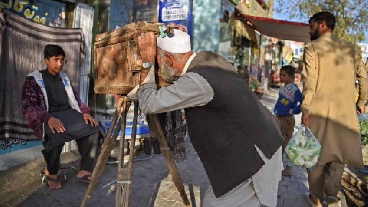 Providing a snapshot of the past, Afghan photographer keeps the box ...