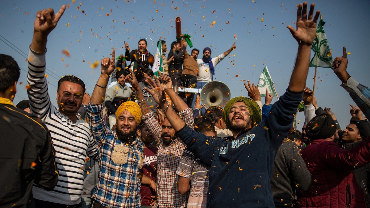 In pics | Farmers celebrate, return home after year-long protests