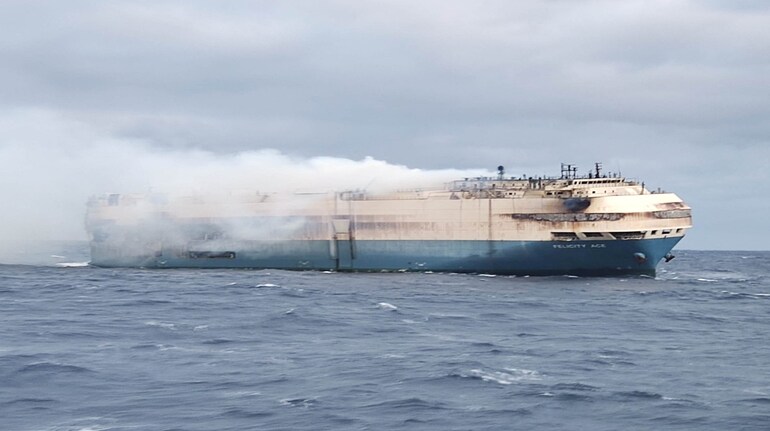 With little left to burn, fire dies down on ship carrying luxury cars