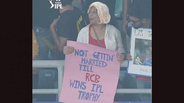 'Not getting married till RCB wins IPL trophy': woman's poster at match ...