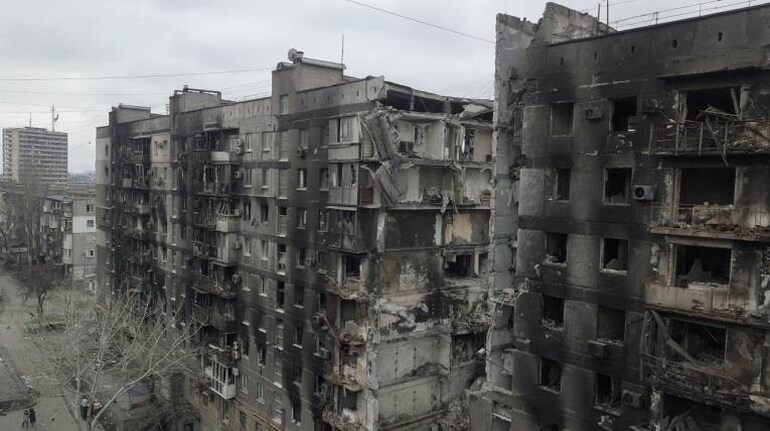 Explosions rock Ukraine, bodies line streets of Mariupol
