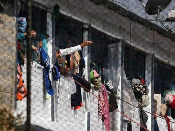 At least 51 dead in prison riot fire in Colombia, prisons agency says