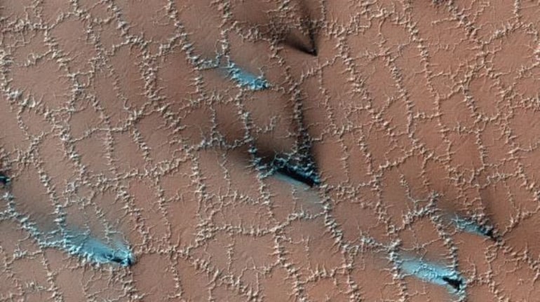 Mysterious markings appear on Mars as Spring blooms over Red Planet