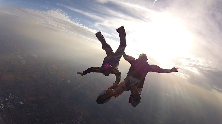 Skydiver hits scoreboard at Virginia tech game, rescued without injury