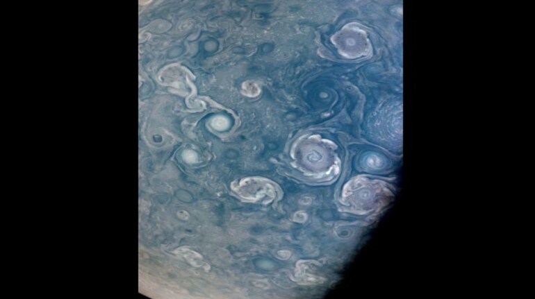 Striking NASA photo captures 'powerful storms' near Jupiter's north pole