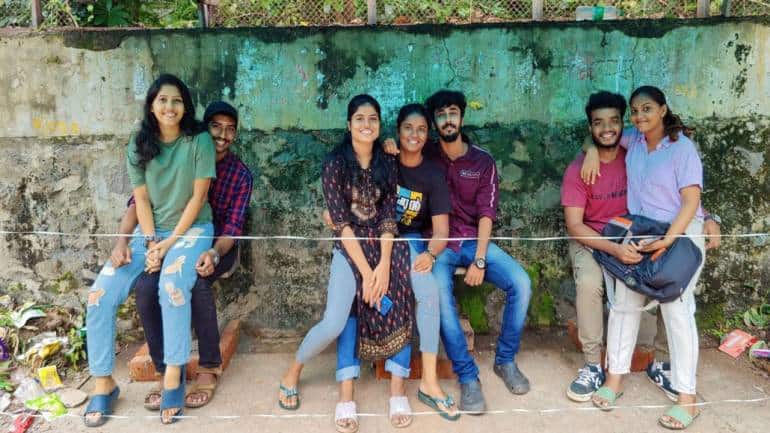 Kerala students sit on each other's laps at bus stop to protest moral ...