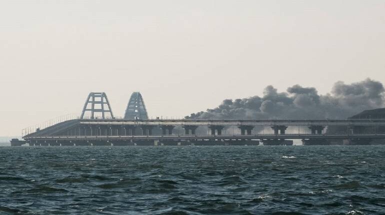 Blast hits Crimea bridge crucial to Russia's war