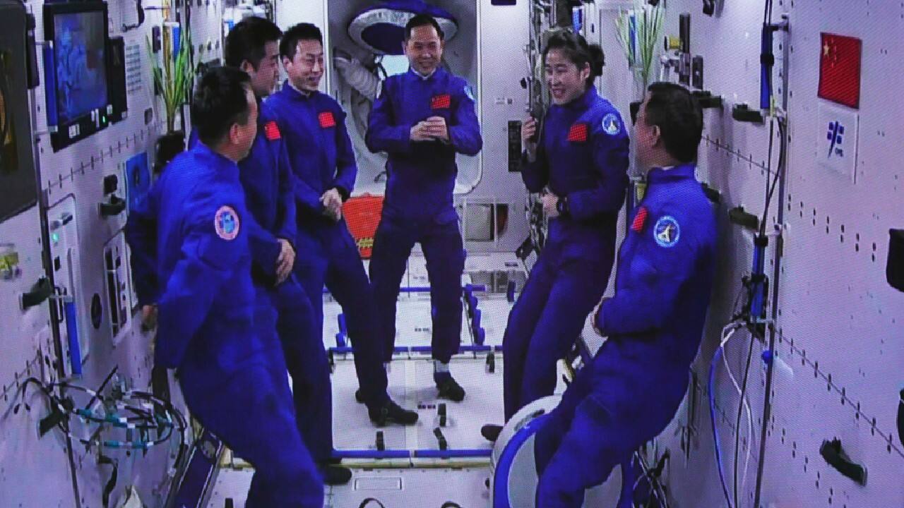 Chinese spaceship with 3 aboard docks with space station