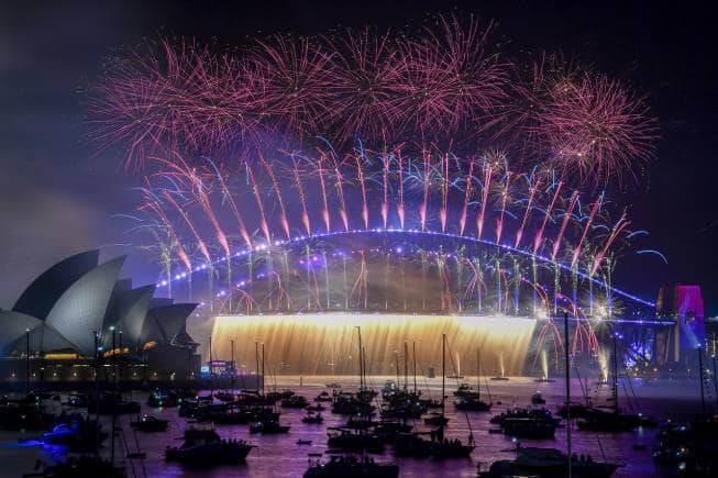 Australia shakes off COVID to ring New Year as world starts ushering ...
