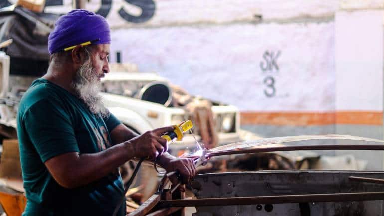 Crush injuries and insurance woes: Life of workers at Indian auto ...
