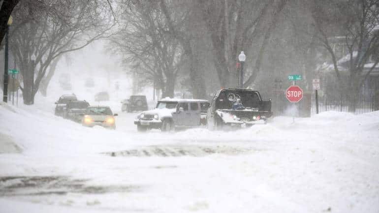 Flights cancelled, highways closed as winter storm wallops US