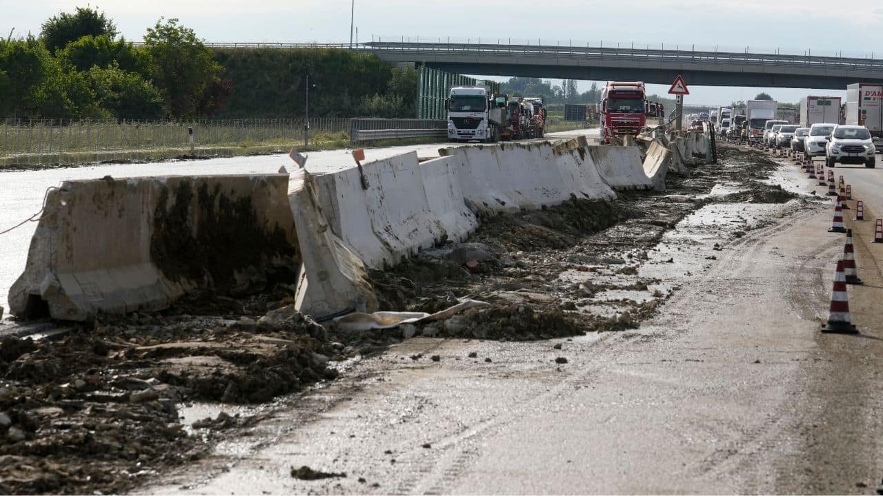 In Pics: Rescue workers reach Italian towns isolated by floods as death ...