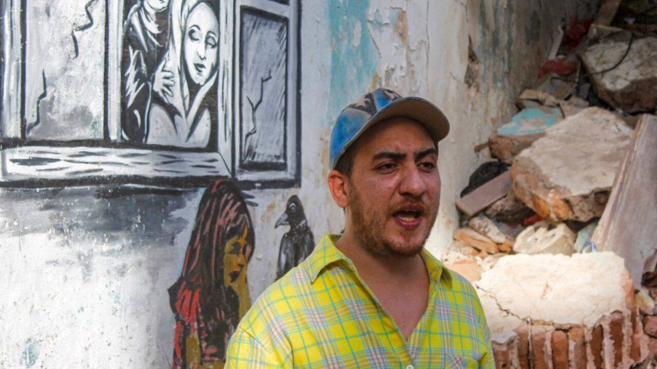 Yemen street artist chronicles war on battle-scarred walls