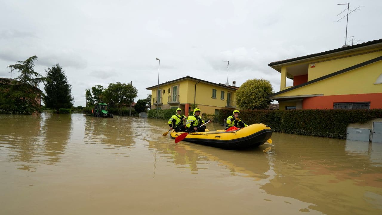 In Pics: Rescue workers reach Italian towns isolated by floods as death ...