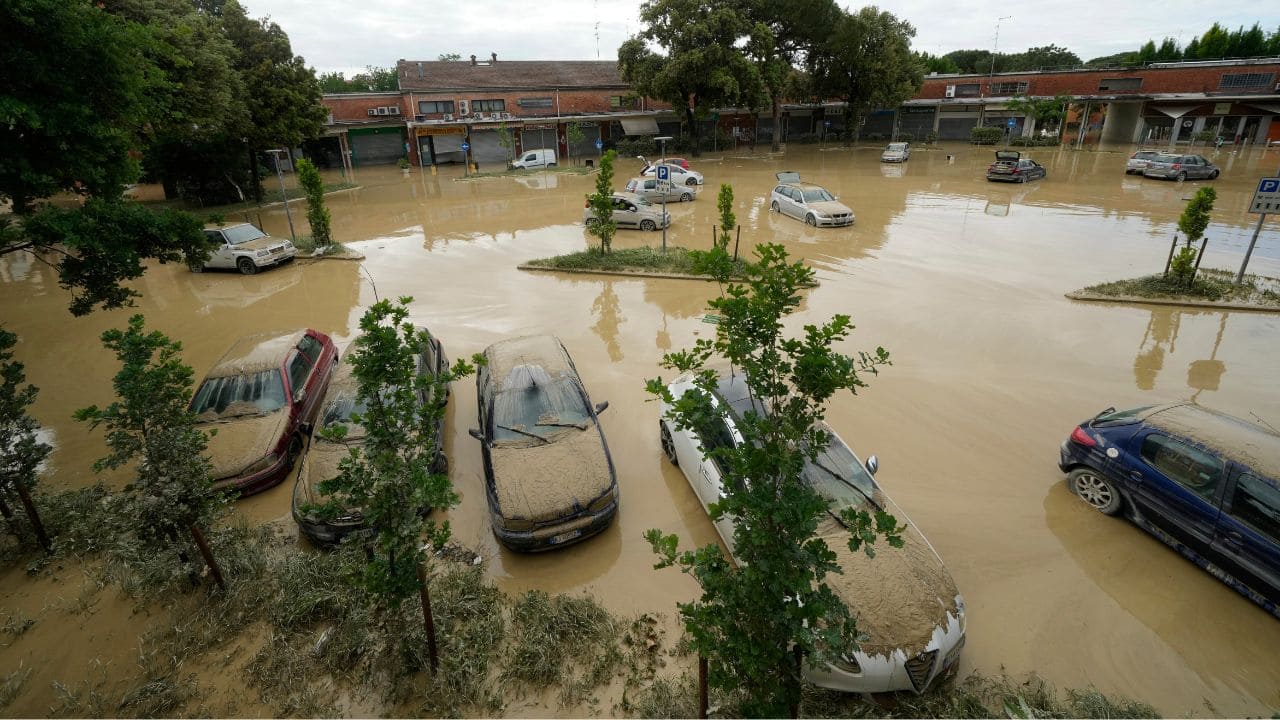 In Pics: Rescue workers reach Italian towns isolated by floods as death ...