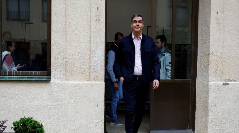 Spain government calls snap election after regional ballot rout