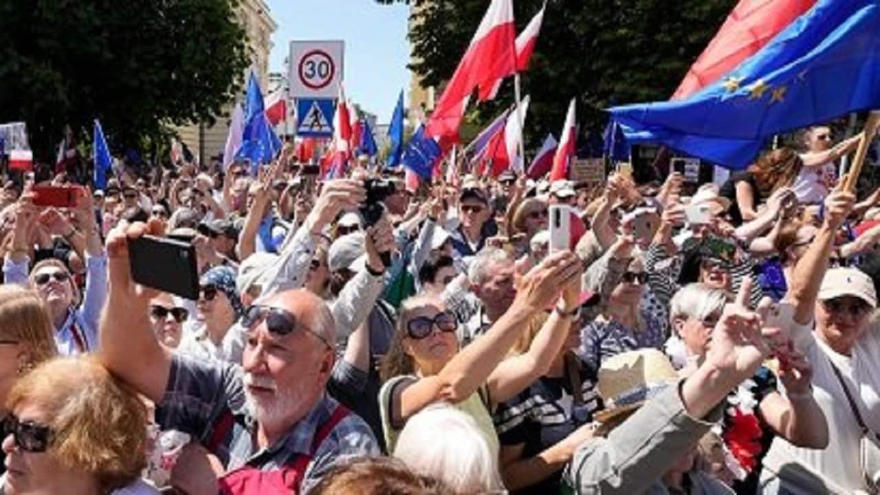 In pics | Thousands march in Poland anti-govt protests to show support ...