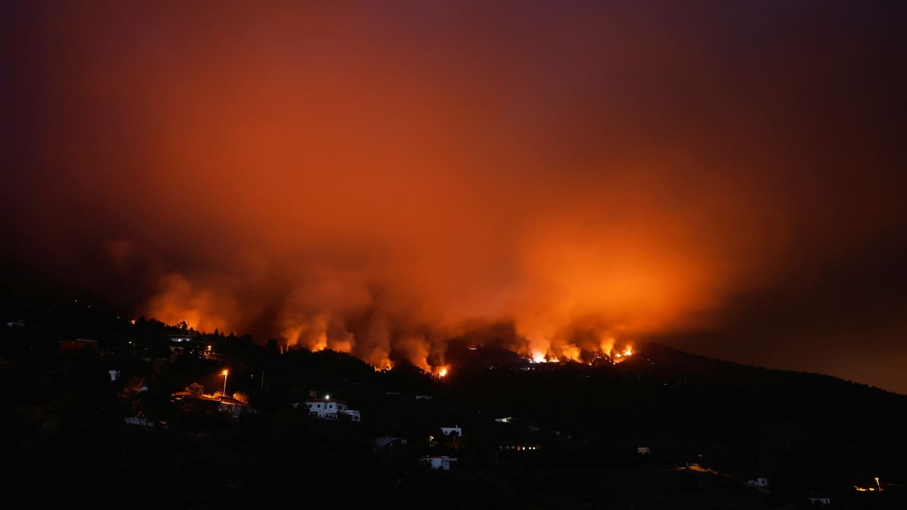 In Pics: Thousands evacuated as firefighters battle La Palma wildfire ...