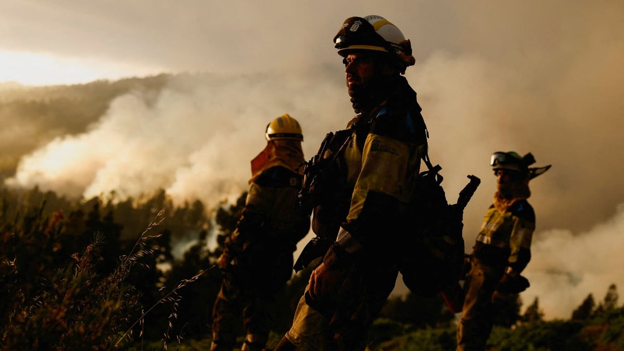In Pics: Thousands evacuated as firefighters battle La Palma wildfire ...